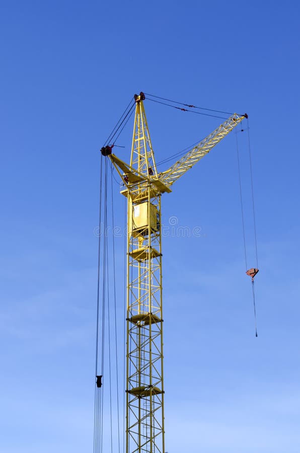 The crane on building stock image. Image of house, building - 37404271