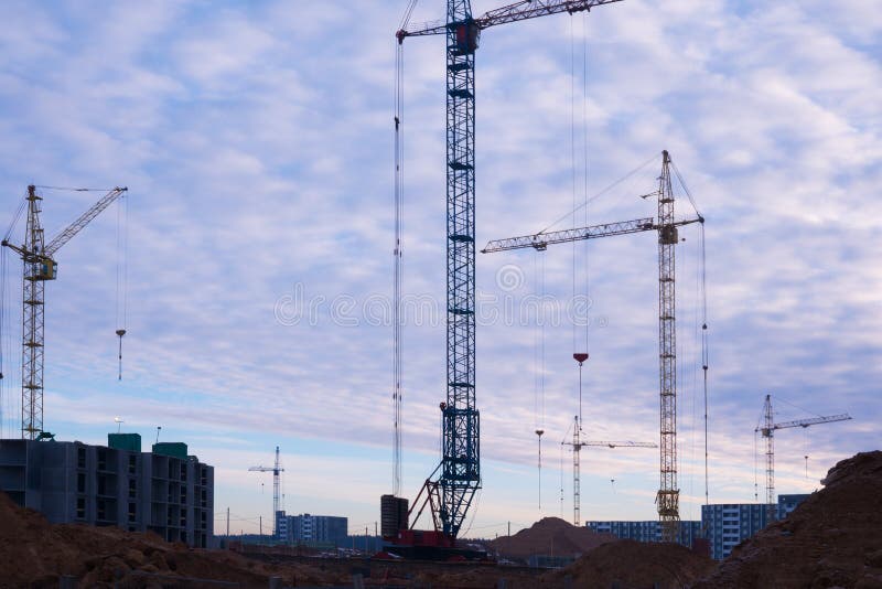 Crane and Building Construction Site at Sunset, Sunrise Stock Image ...