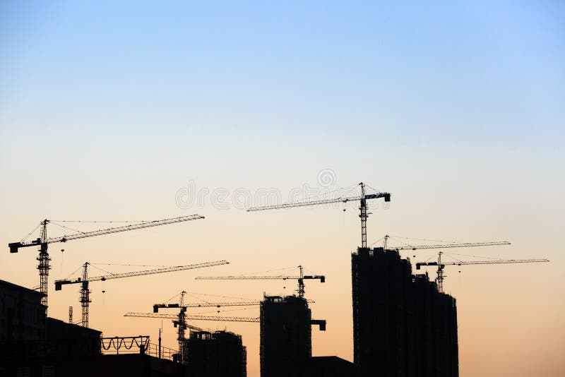 Crane and Building Construction Site at Sunset View Stock Photo - Image ...