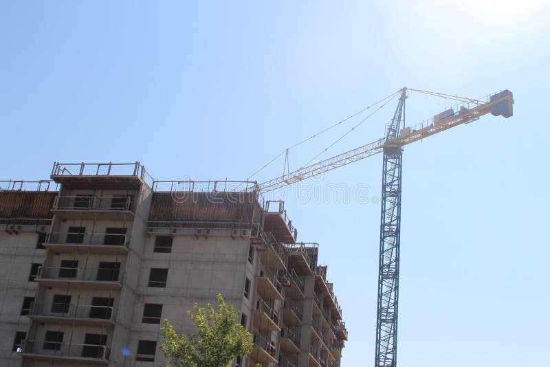 Crane Building a High Rise Apartment Building Stock Image - Image of ...