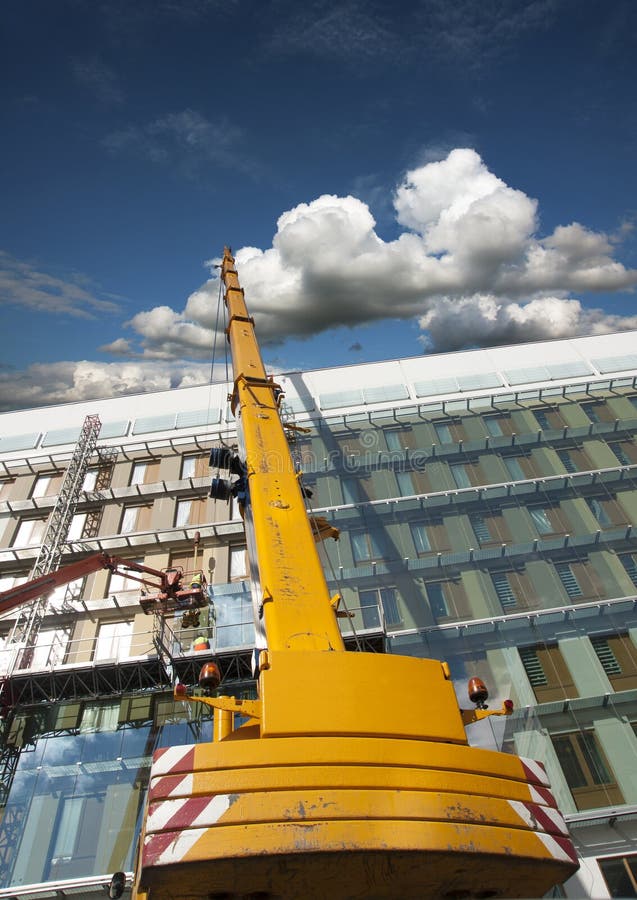 Crane at building site stock photo. Image of building - 26405298