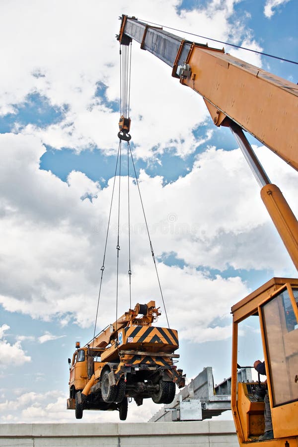 Crane carrying a cargo stock photo. Image of truck, site - 67945490