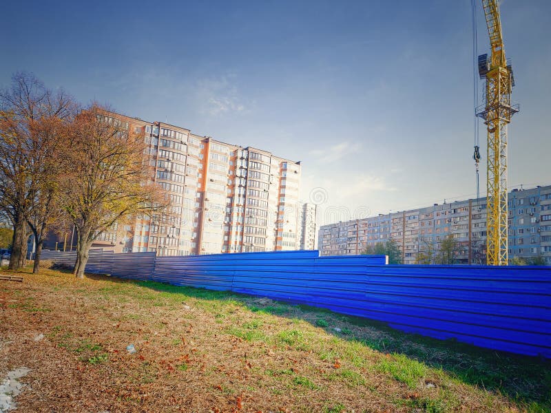 Crane at a Construction Site Lifts a Concrete Slab. Stock Image - Image ...