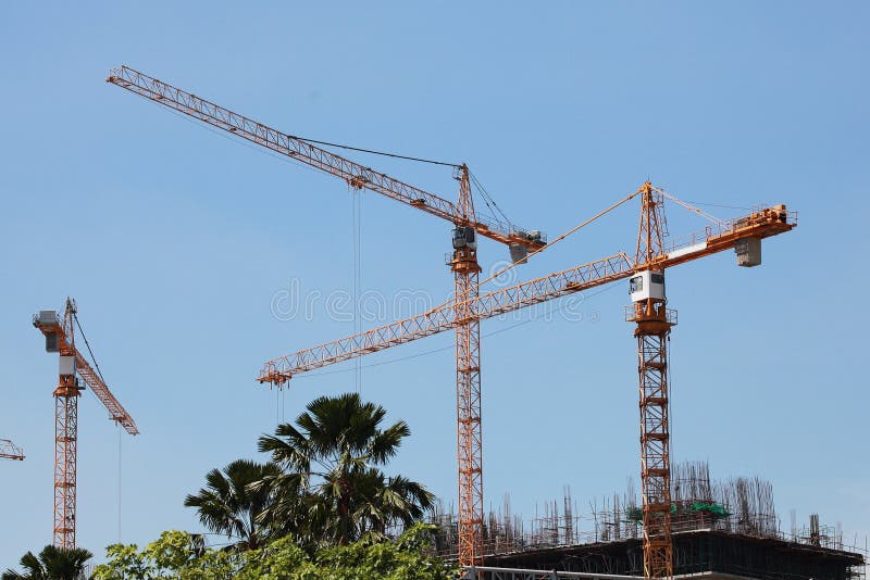 Crane at construction site stock photo. Image of rigging - 54841800