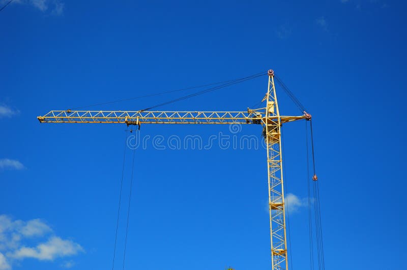 Crane Construction. Tower Crane in Construction Site. Crane Building ...