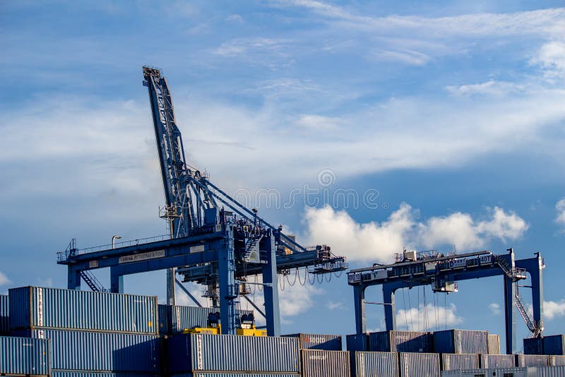 Crane and Container Box for Logistic Against Blue Sky Editorial Stock ...