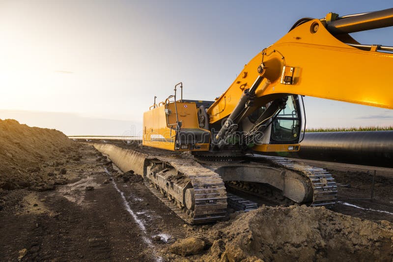 Crane Digging a Channel for Gas Pipeline Stock Image - Image of digging ...