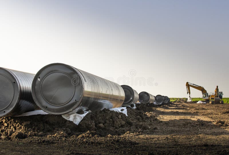 Crane Digging a Channel for Gas Pipeline Stock Image - Image of digging ...