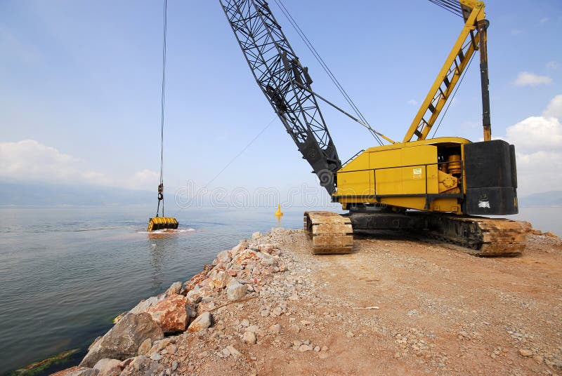 Crane dredging sea stock image. Image of industrial, working - 35049719