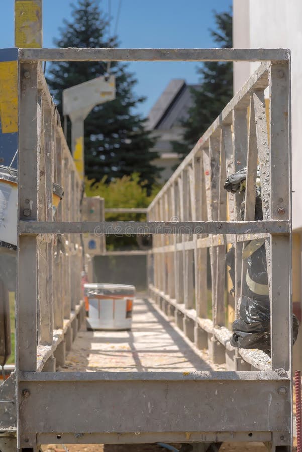 A Crane (elevator) for Plastering Works Hung on the Wall of an ...