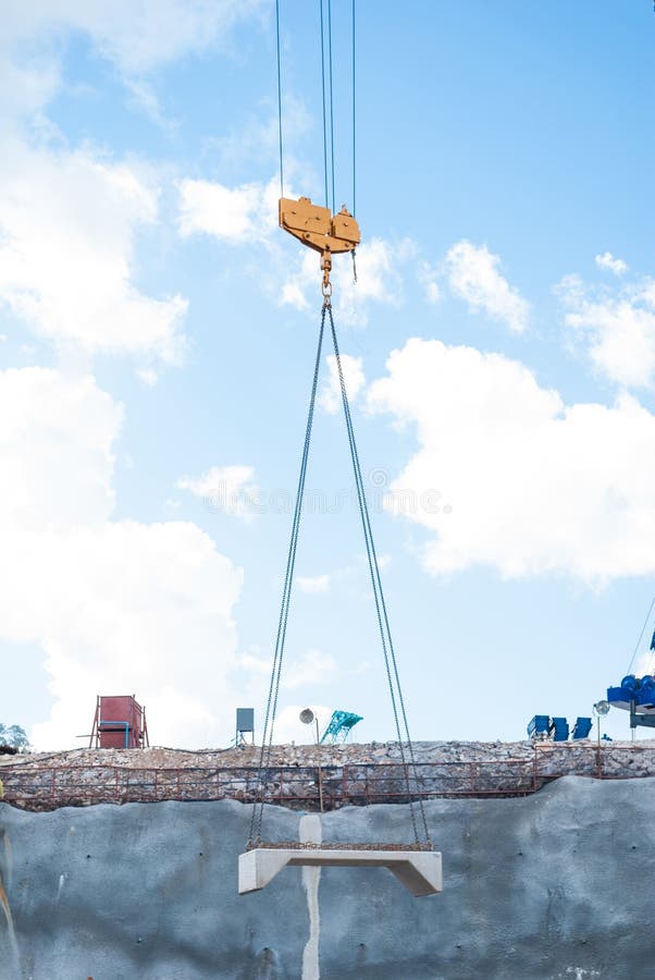 Crane Hoisting Concrete Blocks Stock Image - Image of engineering, boom ...