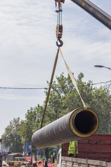 Crane Hook Lifting Massive Steel Pipe Stock Photo - Image of isolation ...