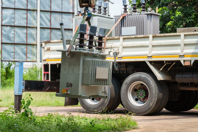 Crane Hook Lifts Up Distribution Transformer Stock Photo - Image of ...