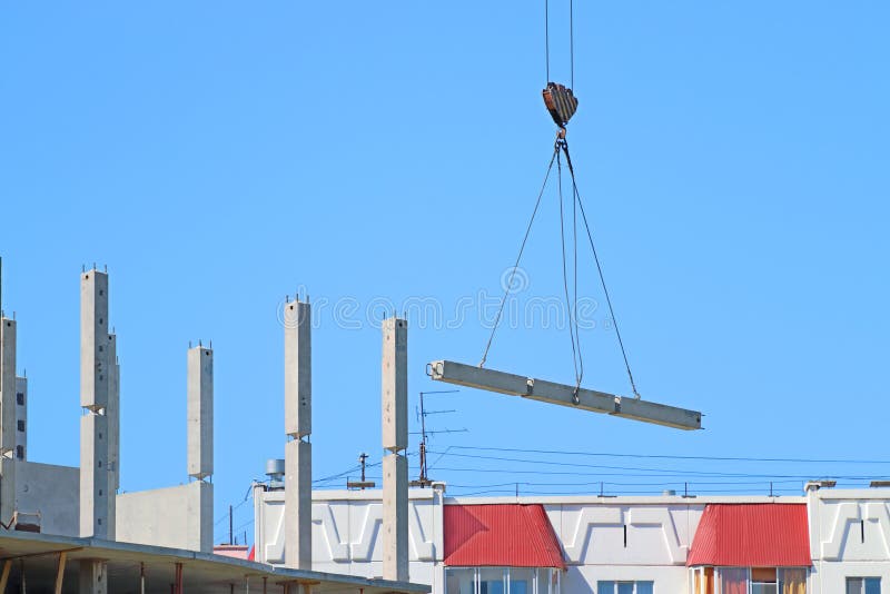 Crane Hook with Load and Part of Building Under Construction Stock ...