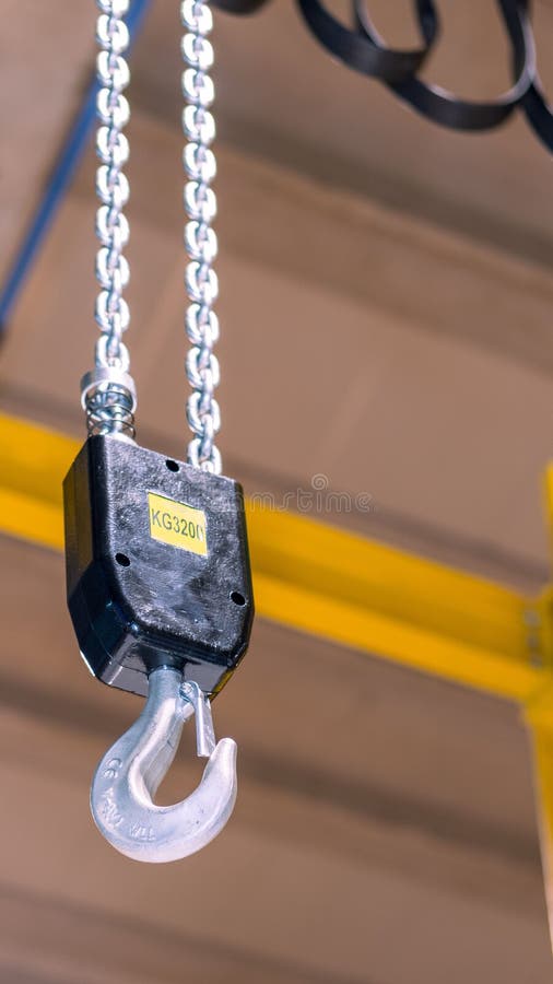Crane Hooks on a Thick Chain Inside the Factory Floor Stock Photo ...