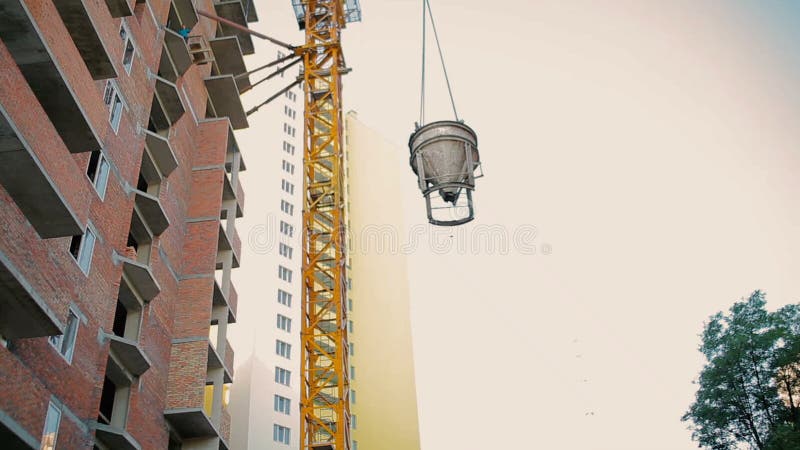 The Crane Lift the Bucket with Cement Stock Video - Video of ...