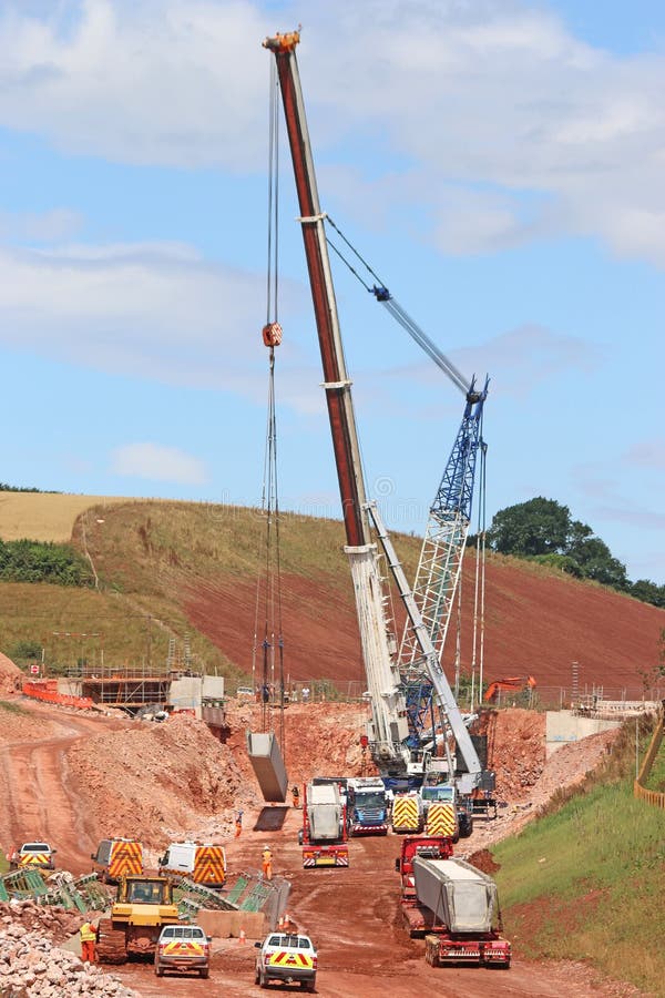 Crane Lifting a Concrete Bridge Beam Editorial Image - Image of workers ...