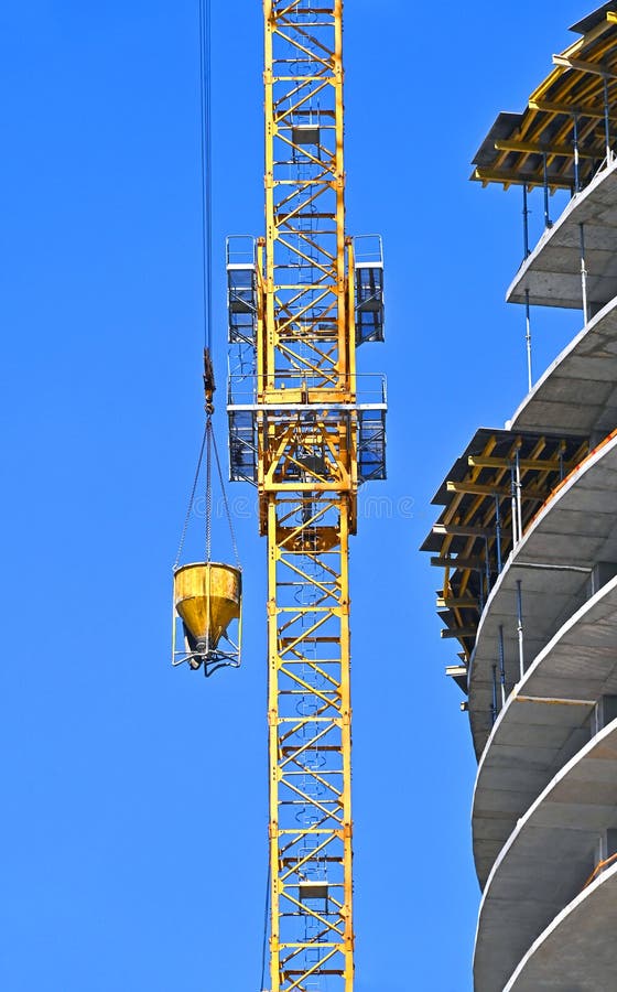 Crane Lifting Cone Tank for Cement Stock Photo - Image of concrete ...
