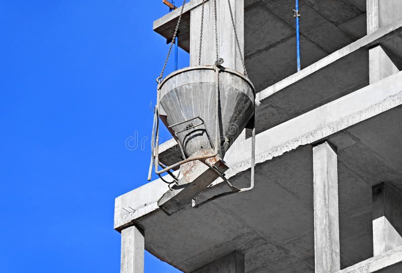 Crane Lifting Cone Tank for Cement Stock Photo - Image of building ...