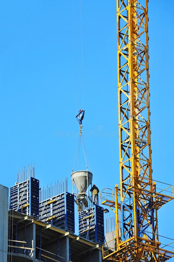 Crane Lifting Cone Tank for Cement Stock Photo - Image of condominium ...