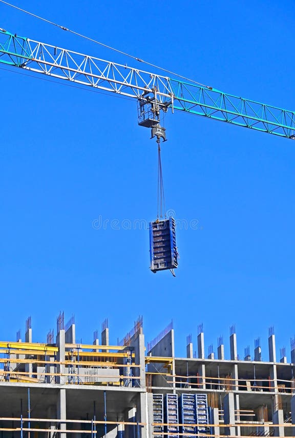 Crane lifting formwork stock image. Image of home, realestate - 322627905