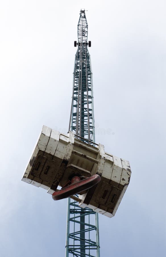 Crane lifting heavy object stock photo. Image of mechanized - 16007210