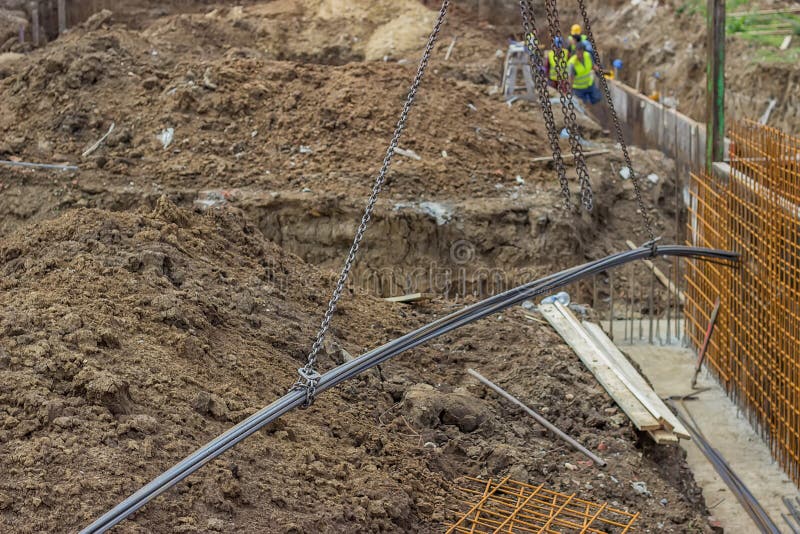 Crane Lifting Iron Rods stock image. Image of high, constructor - 41260639