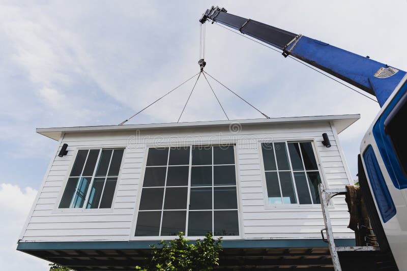 Crane Lifting a Knock Down Private House. Stock Image - Image of ...