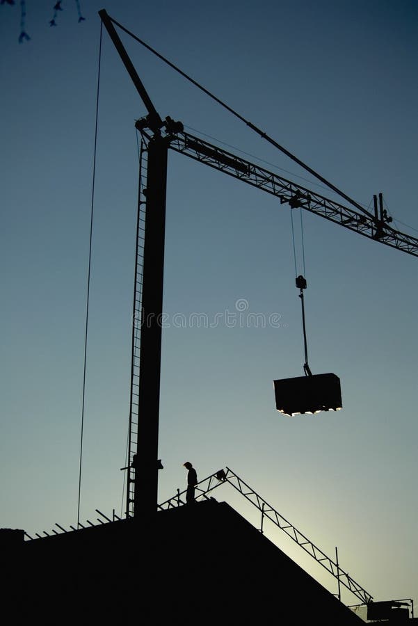 A Crane is Lifting a Large Object Stock Photo - Image of lifting ...
