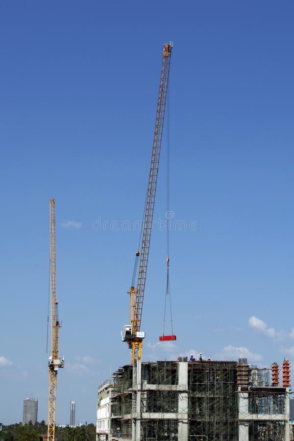 Crane Lifting Material for Building Construction. Stock Image - Image ...