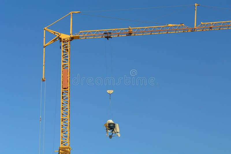 Crane lifting mixer stock image. Image of lift, work, mixer - 763421