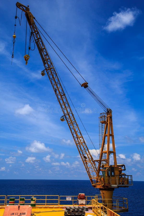 Crane lifting offshore stock photo. Image of electricity - 148102740