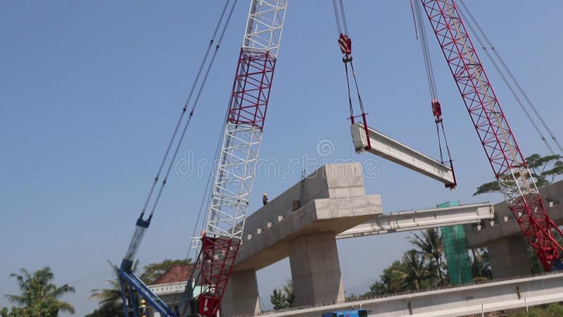 Crane Lifting Pillars for Flyover Construction Stock Footage - Video of ...
