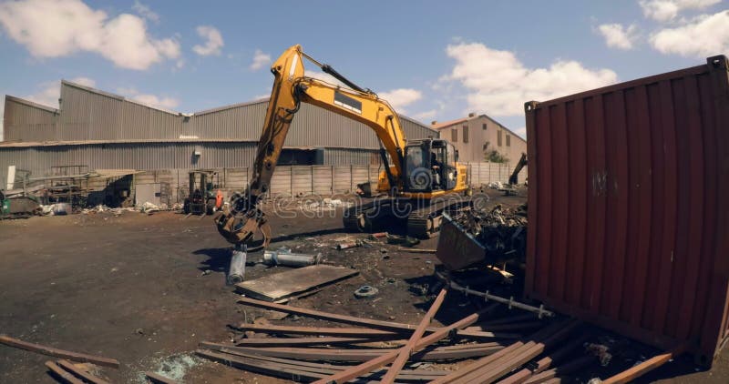 Crane Lifting Scrap Metal Cars in a Junkyard. Stock Footage - Video of ...