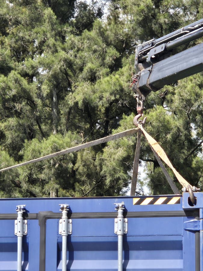 Crane Lifting a Shipping Container Stock Image - Image of crane ...
