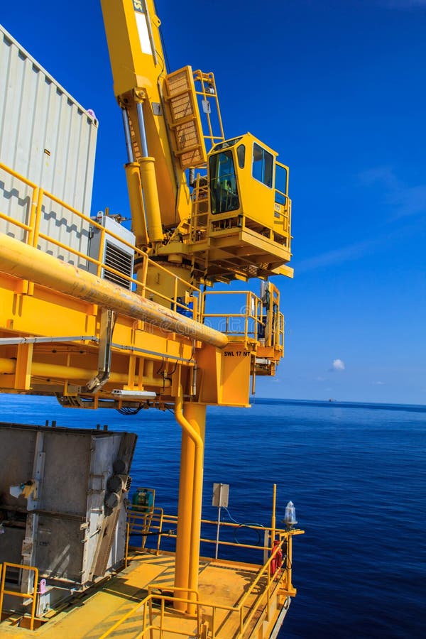 Crane lifting offshore stock photo. Image of construction - 148102734