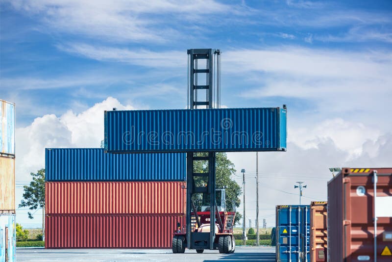 Crane Lifting Up Container in Railroad Yard. Crane Lifting Up Container ...