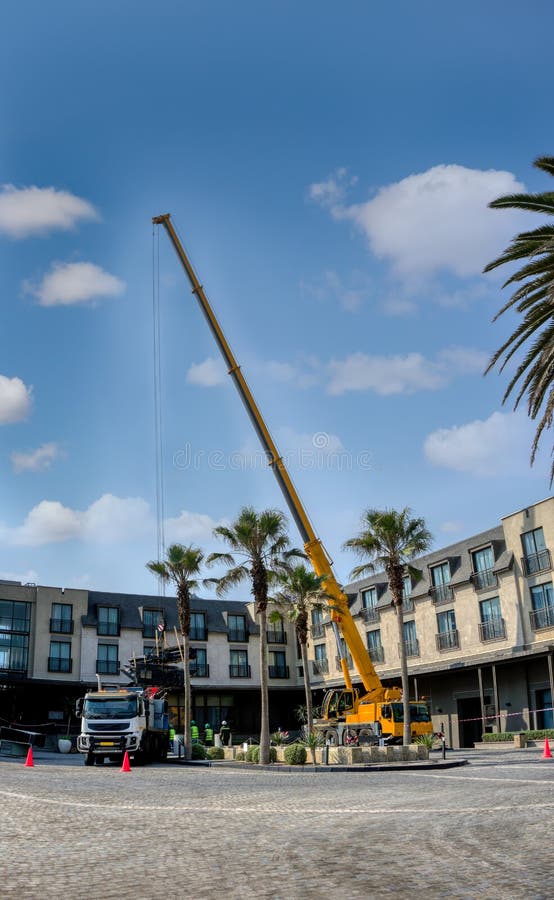 Crane lifting weight stock image. Image of team, outrigger - 269349607