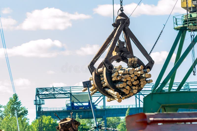 Crane lifting wood logs stock image. Image of tree, equipment - 280110525