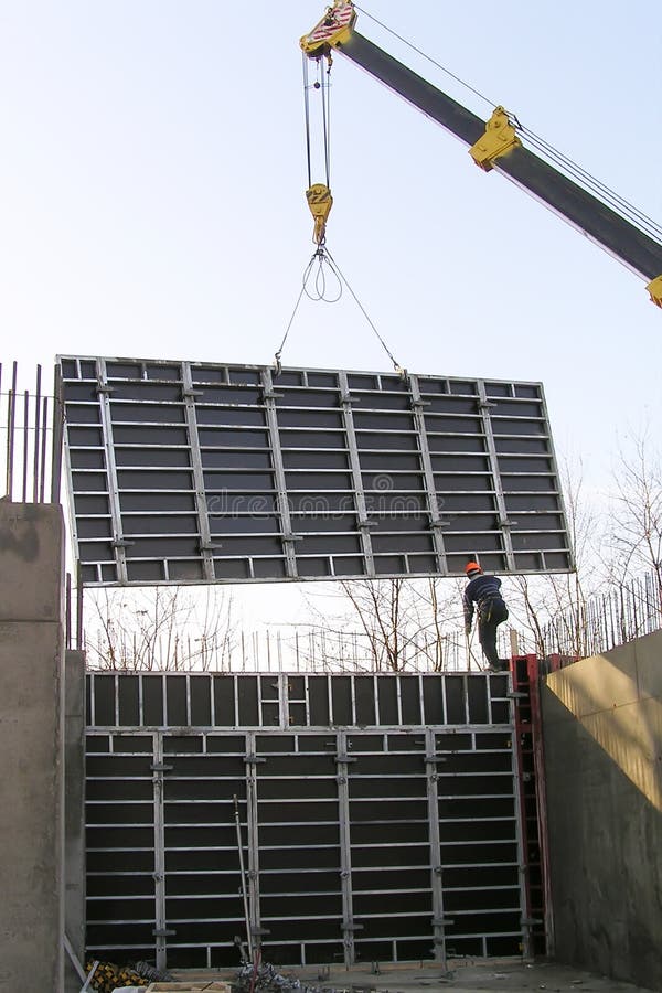 Crane lifts formwork stock photo. Image of tube, project - 252155614