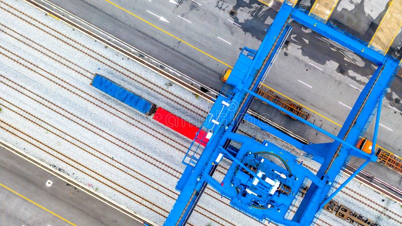 Crane Loading Container on a Train, Rails in Container Port, Aerial ...
