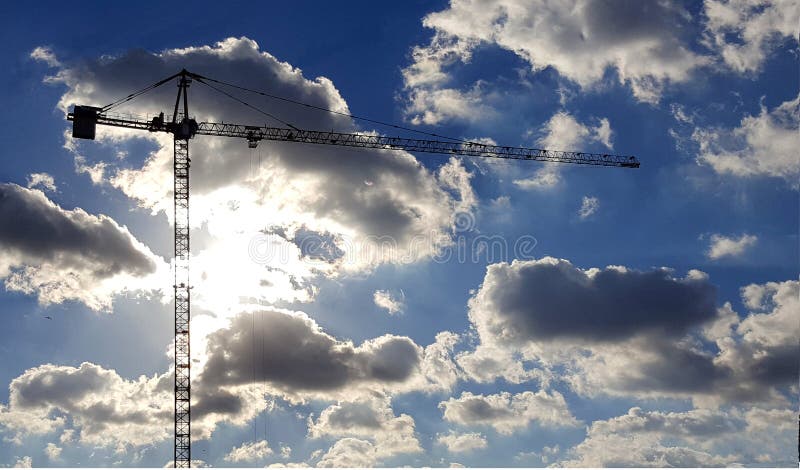 Crane Machine Over a Blue Sky Stock Photo - Image of exterior, crane ...