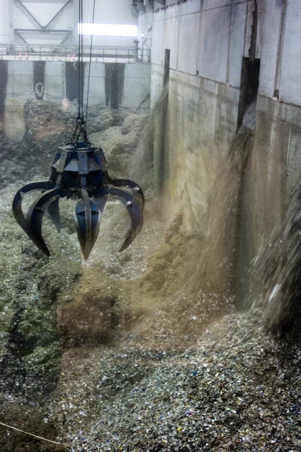 Crane Manipulator in the Garbage Factory Stock Photo - Image of ...
