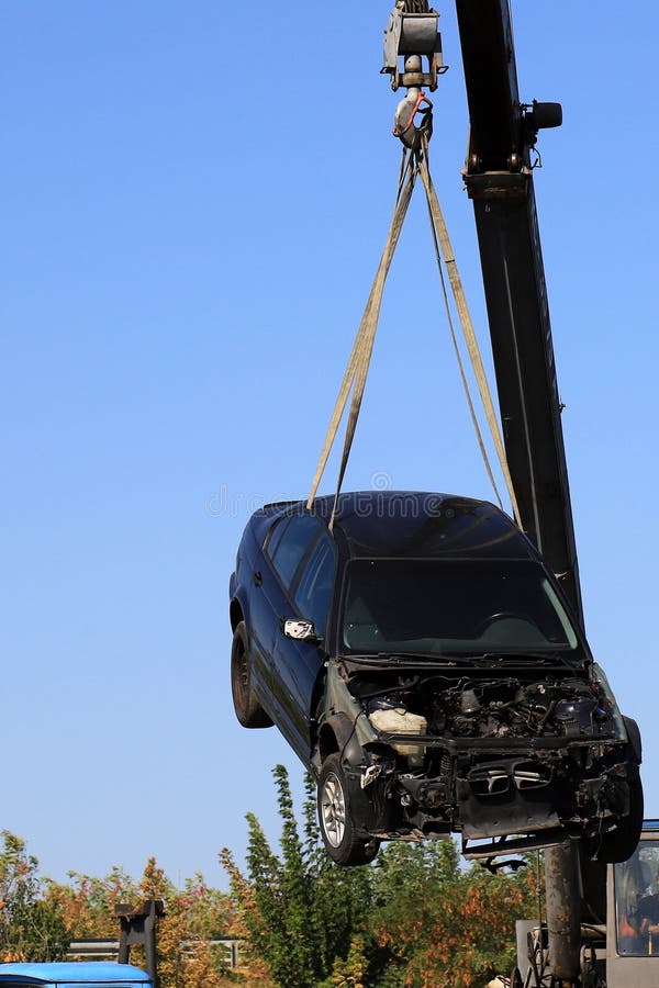 Crane Moves a Wrecked Car after an Accident. Car Accident, Collision ...