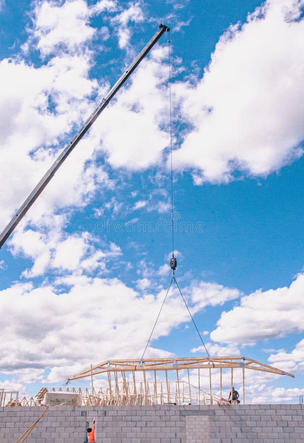 Crane Moving Roof Trusses, into Position Over, Cinder Block Walls ...