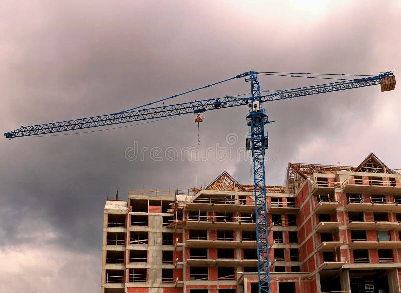 Crane and new building stock photo. Image of site, buildings - 137880332