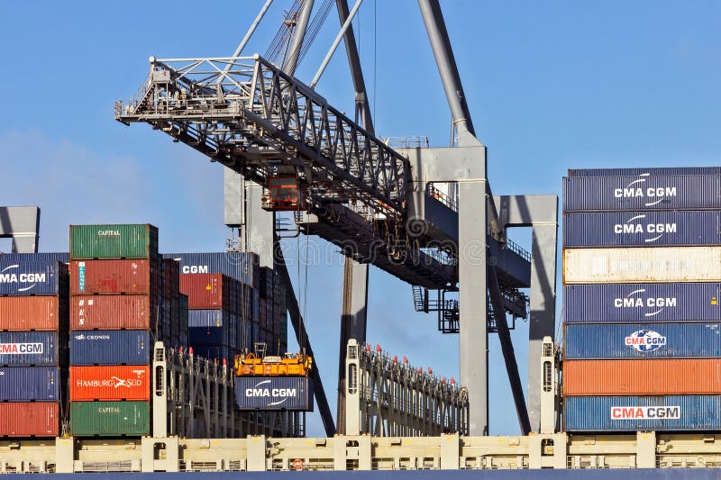 Crane Operator Unloading a Container from a Cargo Ship Editorial ...