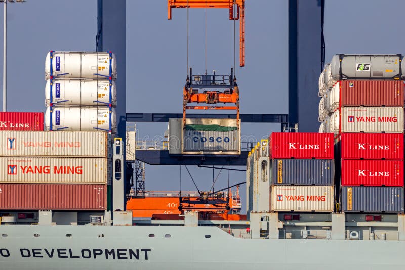 Crane Operator Unloading a Sea Container from a Cargo Ship the Port of ...