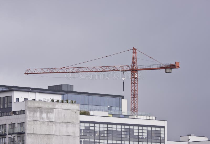 Crane over the building stock image. Image of horizontal - 18754387