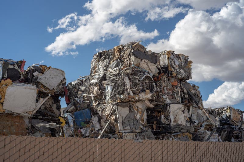Crane Stacking Cubes of Compressed Metal at Recycling Center Stock ...